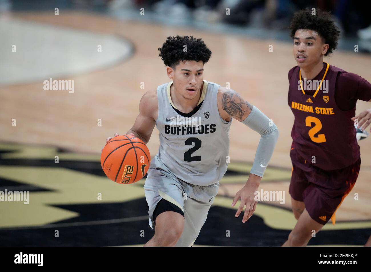 Colorado guard KJ Simpson (2) drives past Arizona State guard Austin ...