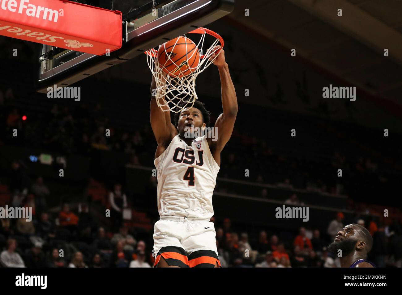 Oregon State guard Dexter Akanno (4) dunks against Washington during ...