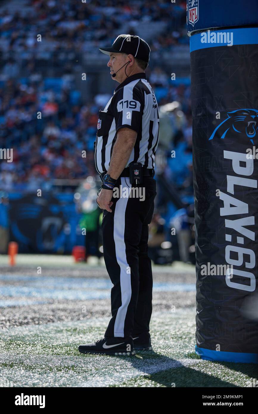 Back judge Greg Wilson (119) at work during an NFL football game ...