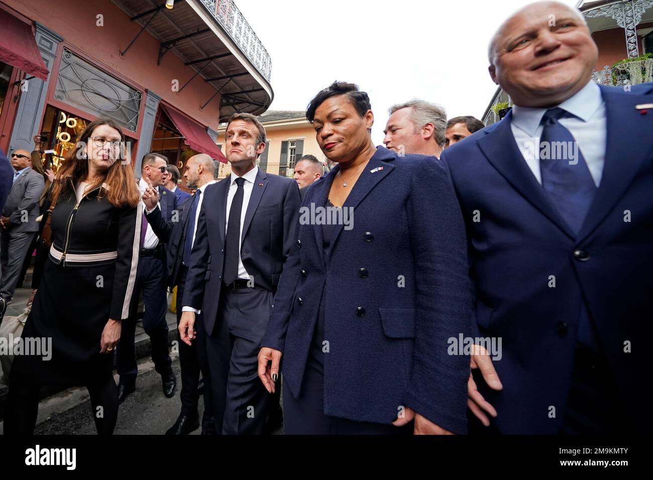 French President Emmanuel Macron walks down Royal St. with New Orleans ...