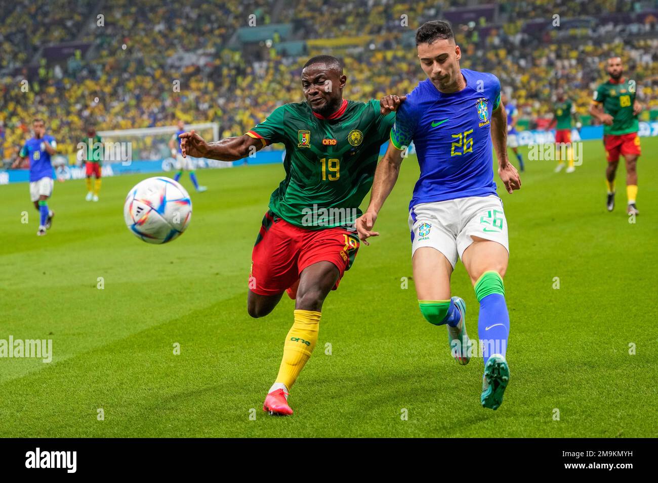 Brazil's Gabriel Martinelli, right, vies for the ball with Cameroon's ...