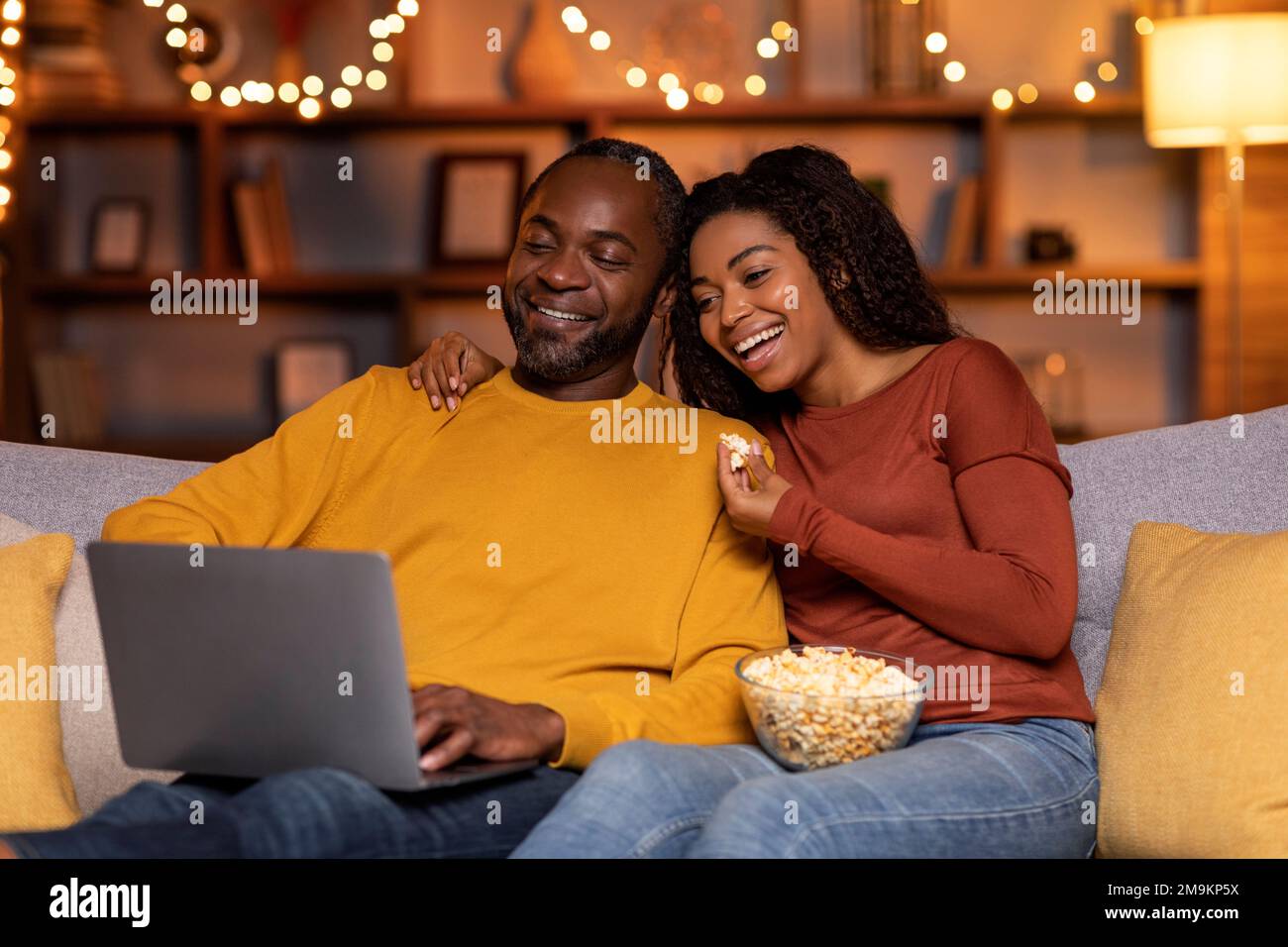Watching tv show together hi-res stock photography and images - Alamy