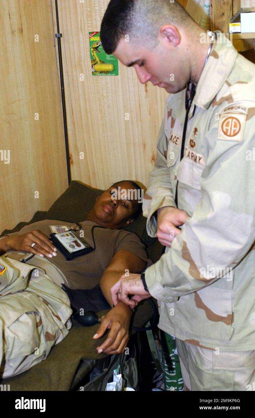 STAFF Sergeant (SSG) Georgina Atchison, 229th Aviation Regiment, XVIII Airborne Corps, has her ...