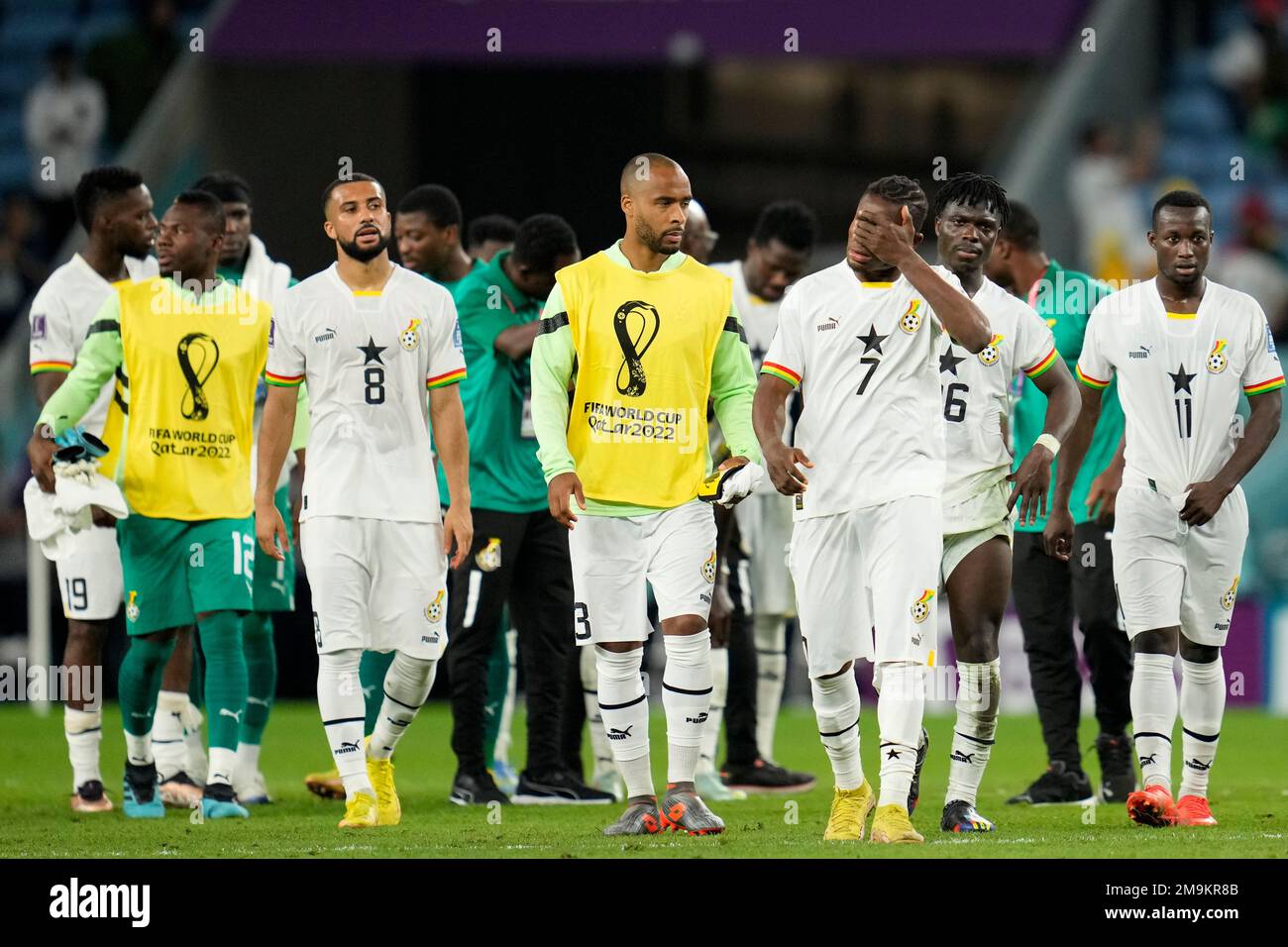 Ghana's players walk on the pitch after the World Cup group H soccer ...