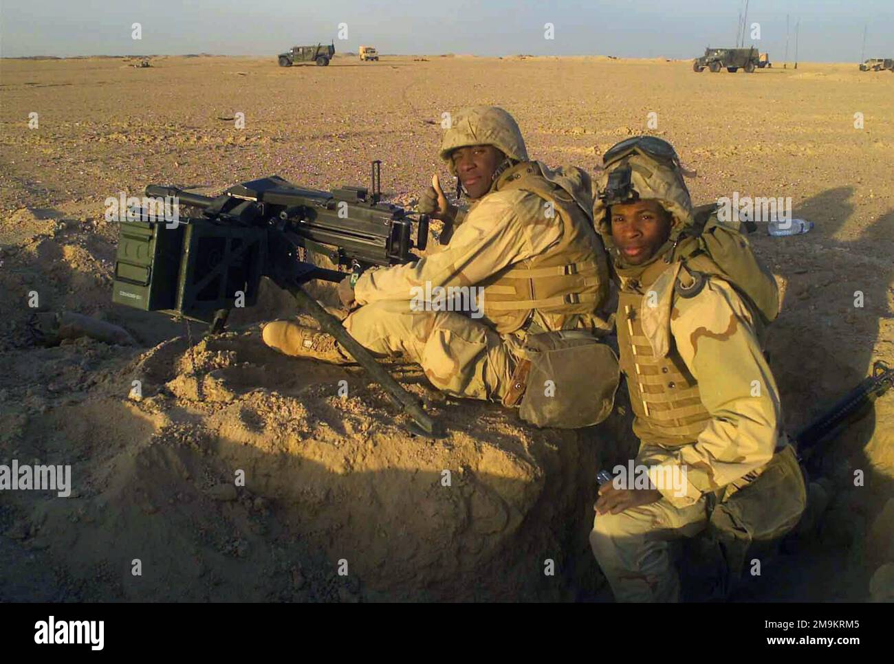 In the desert, US Marine Corps (USMC) Sergeant (SGT) Harold Crawley and ...
