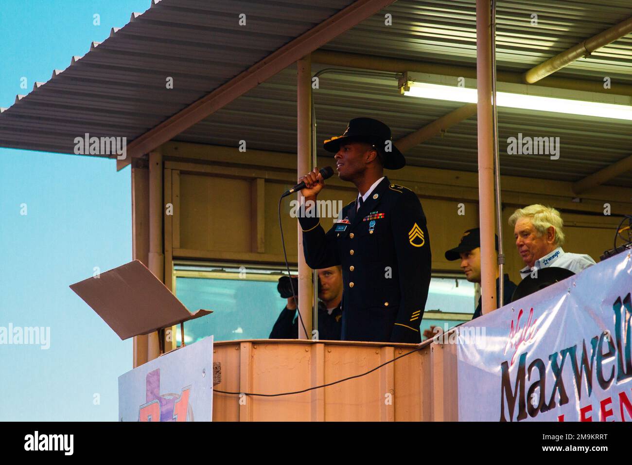 Staff Sgt. Kiari Mhoon, 1st Cavalry Division band vocalist, sings the ...