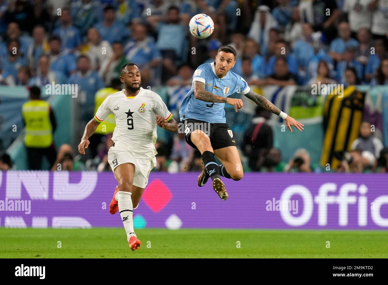 Ghana's Jordan Ayew (9) challenges Uruguay's Matias Vecino during a ...
