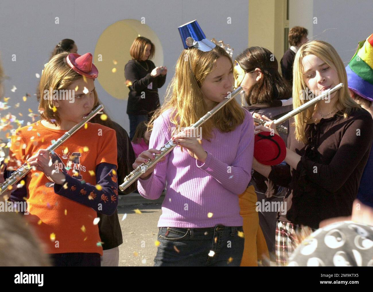 A trio of flautists from the Aviano Elementary School play their ...