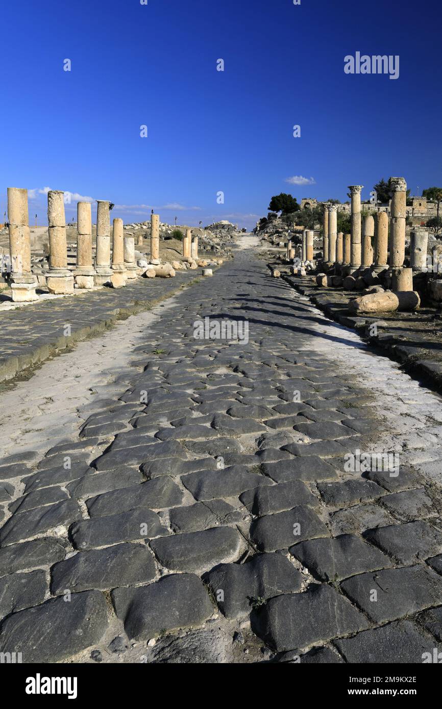View over the ruins of the Decumanus Maximus street, Umm Qais town ...