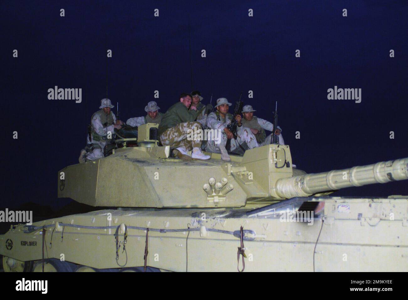 US Marine Corps (USMC) Marines get a tour of a British Challenger 2 Main Battle Tank (MBT) that ...