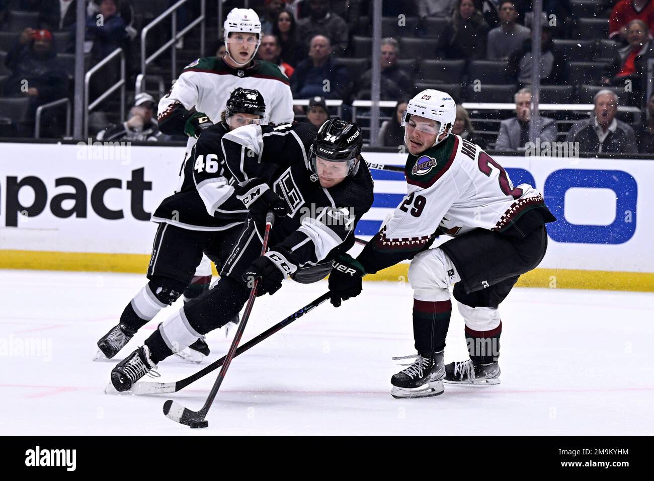 Los Angeles Kings right wing Arthur Kaliyev, center, shoots against ...