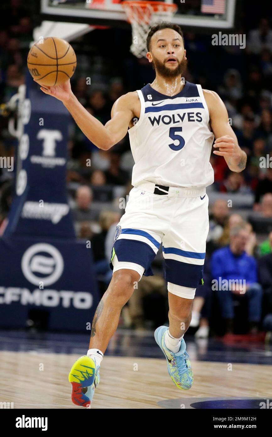 Minnesota Timberwolves forward Kyle Anderson passes during an NBA basketball game against the ...