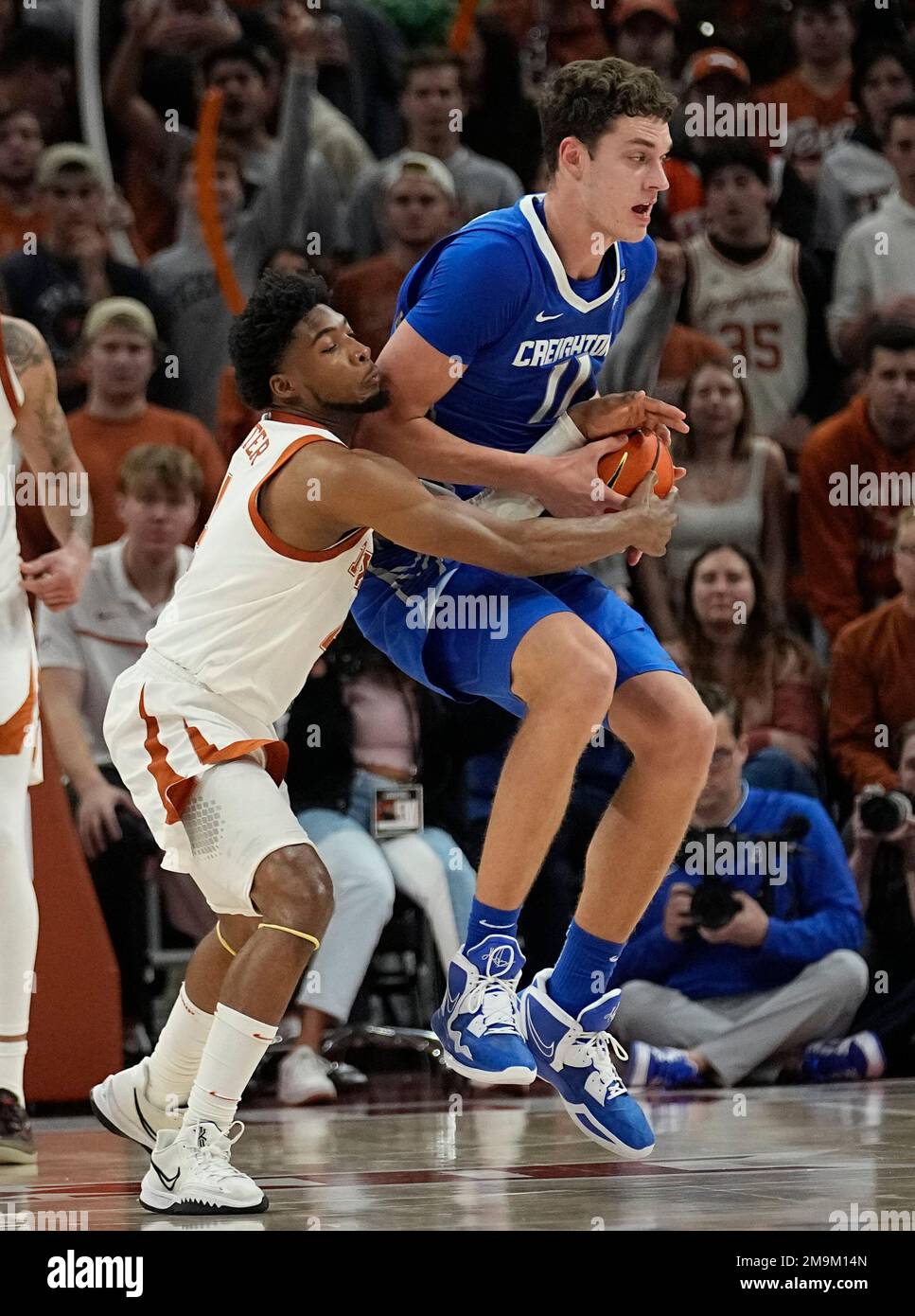 Creighton center Ryan Kalkbrenner (11) tries to keep the ball from ...
