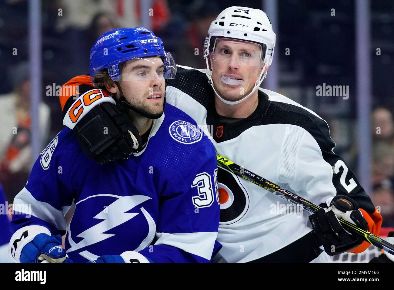 Philadelphia Flyers' Nick Seeler, right, wrestles with Tampa Bay ...
