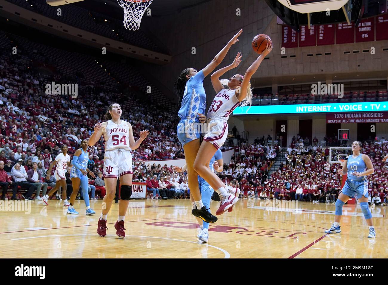 Indiana's Sydney Parrish (33) shoots over North Carolina's Destiny ...
