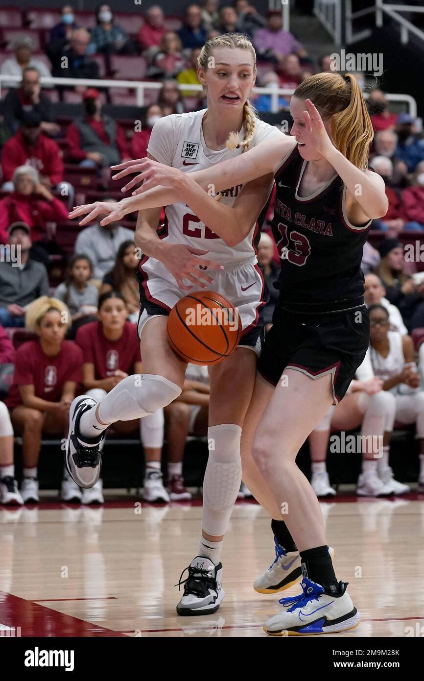 Stanford forward Cameron Brink, left, reaches for the ball next to ...