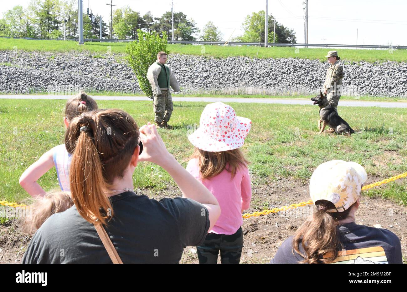 Spc. Daphne Duke and Spc. Landon Porter (in the protective suit ...