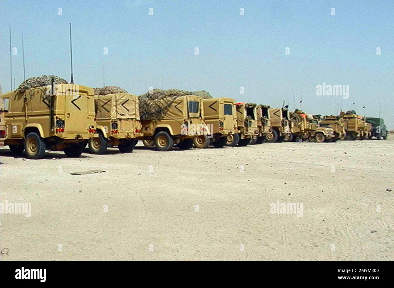 British equipment and vehicles line the road as British forces visit ...