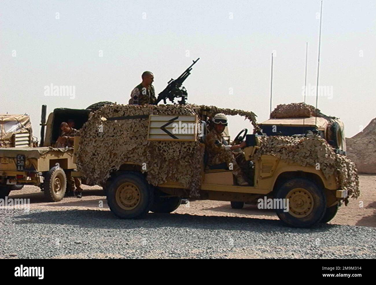 British personnel arrive in a Land Rover Truck Utility Light (TUL ...