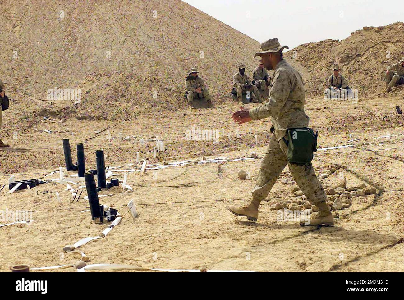 US Marine Corps (USMC) Major (MAJ) Byron Harper (left), S-3 Operations ...