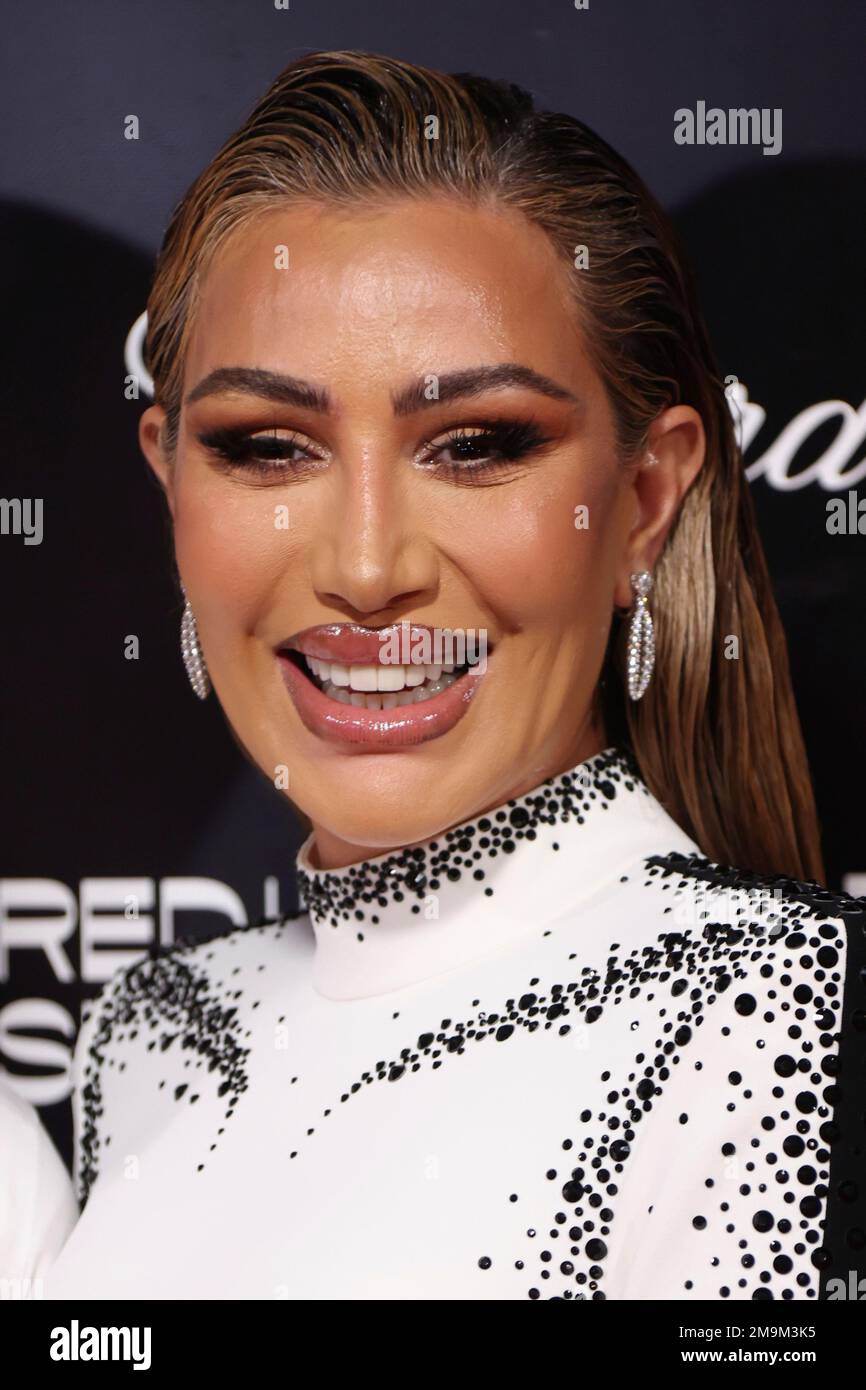 Maya Diab poses for photographers upon arrival at the opening gala ...