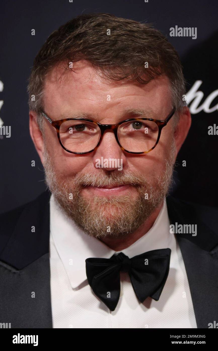 Guy Ritchie poses for photographers upon arrival at the opening gala ceremony for the The Red ...