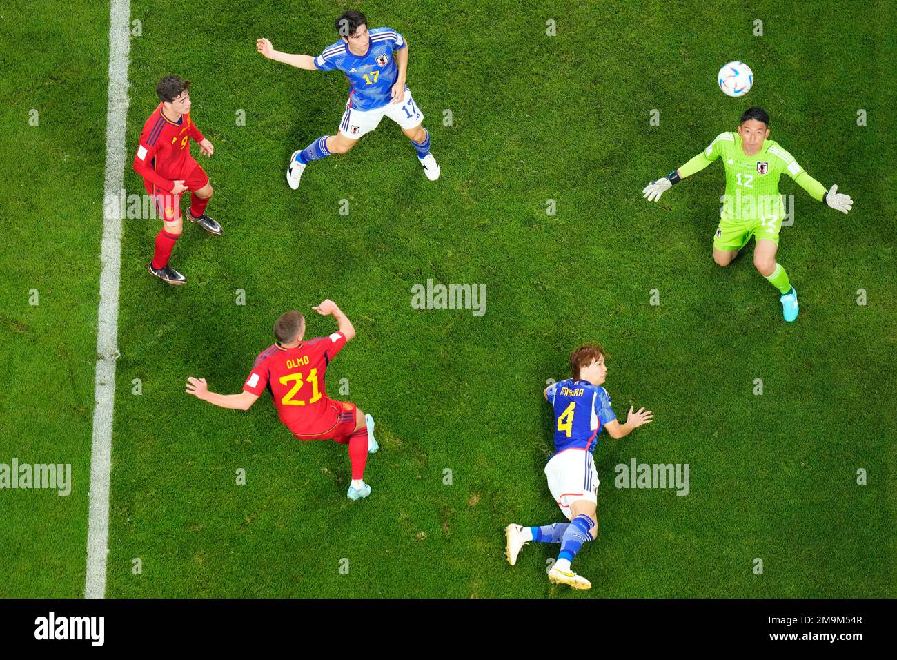 Japan's goalkeeper Shuichi Gonda, right, eyes the ball during the World ...