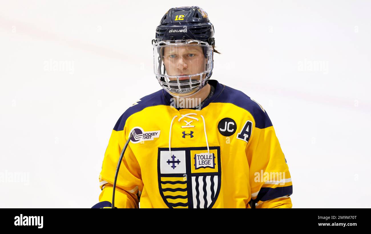 Merrimack College forward Jordan Seyfert (12) skates during the second ...