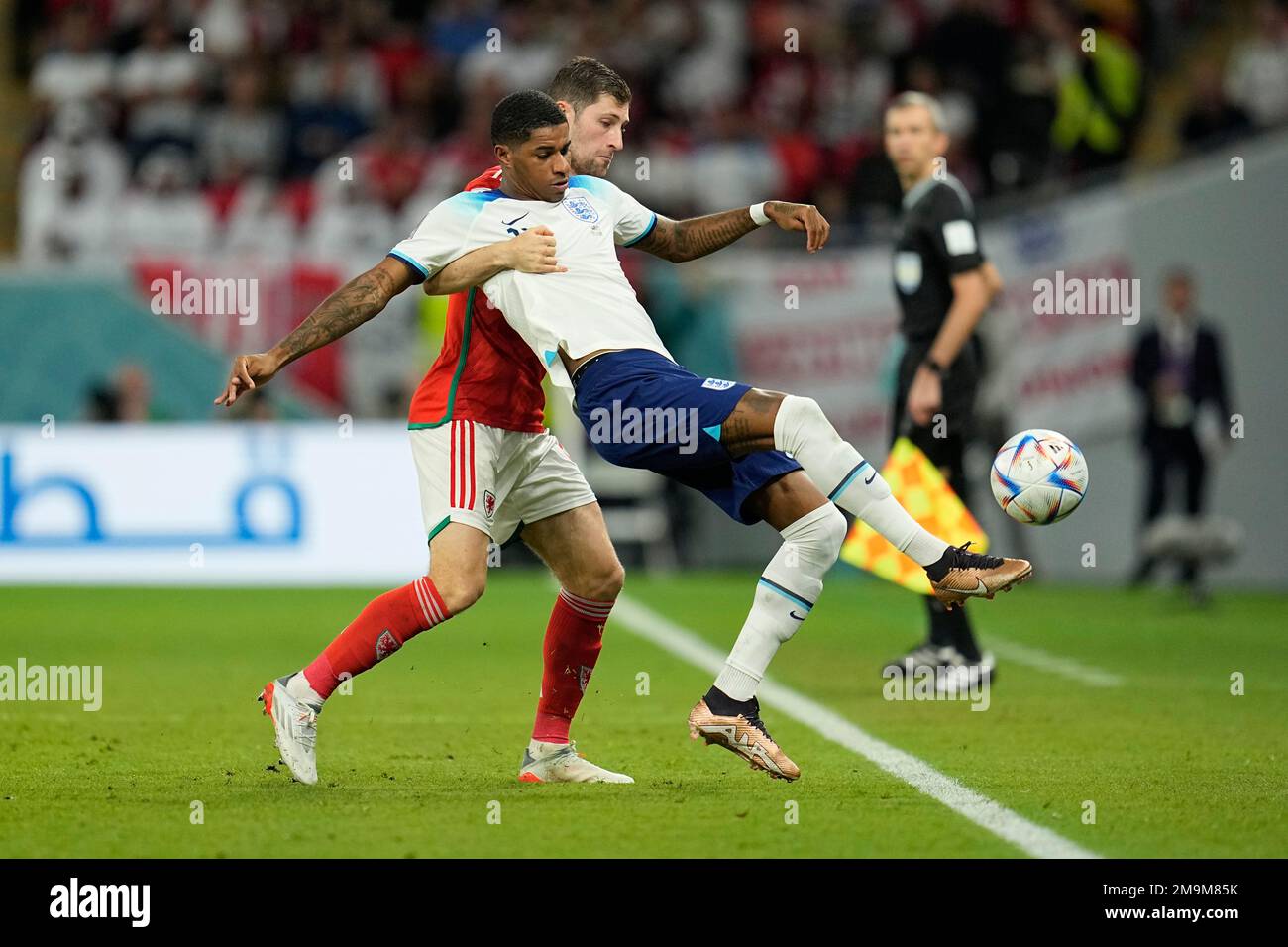 Wales' Ben Davies and England's Marcus Rashford battle for possession ...