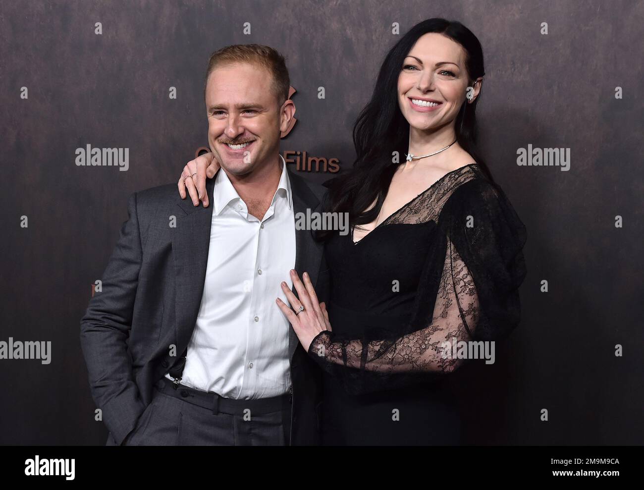 Ben Foster, left, and Laura Prepon arrive at the premiere of ...