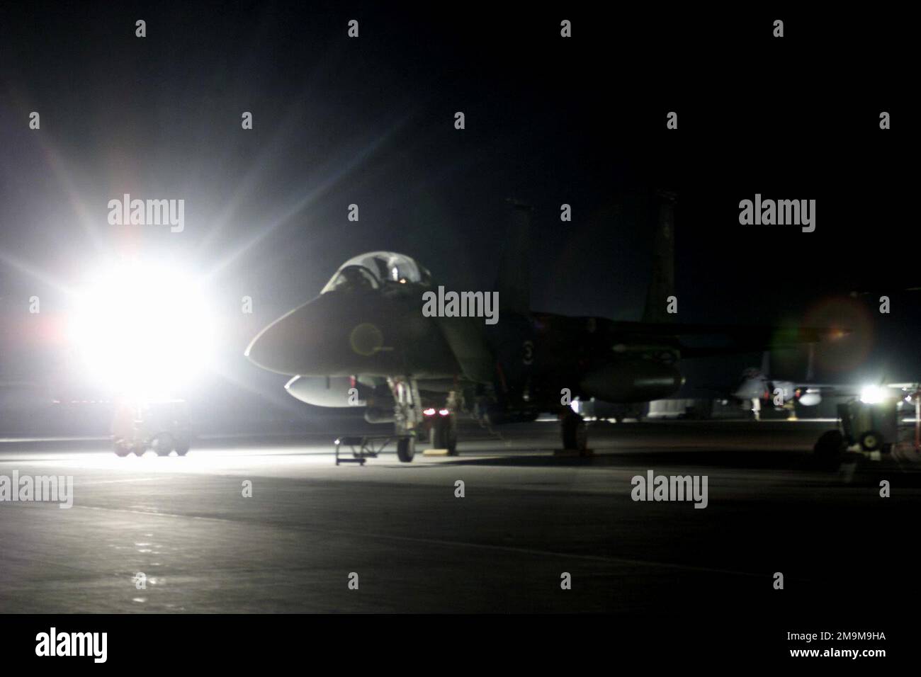 Flood lights are used to illuminate the work area as US Air Force (USFA ...