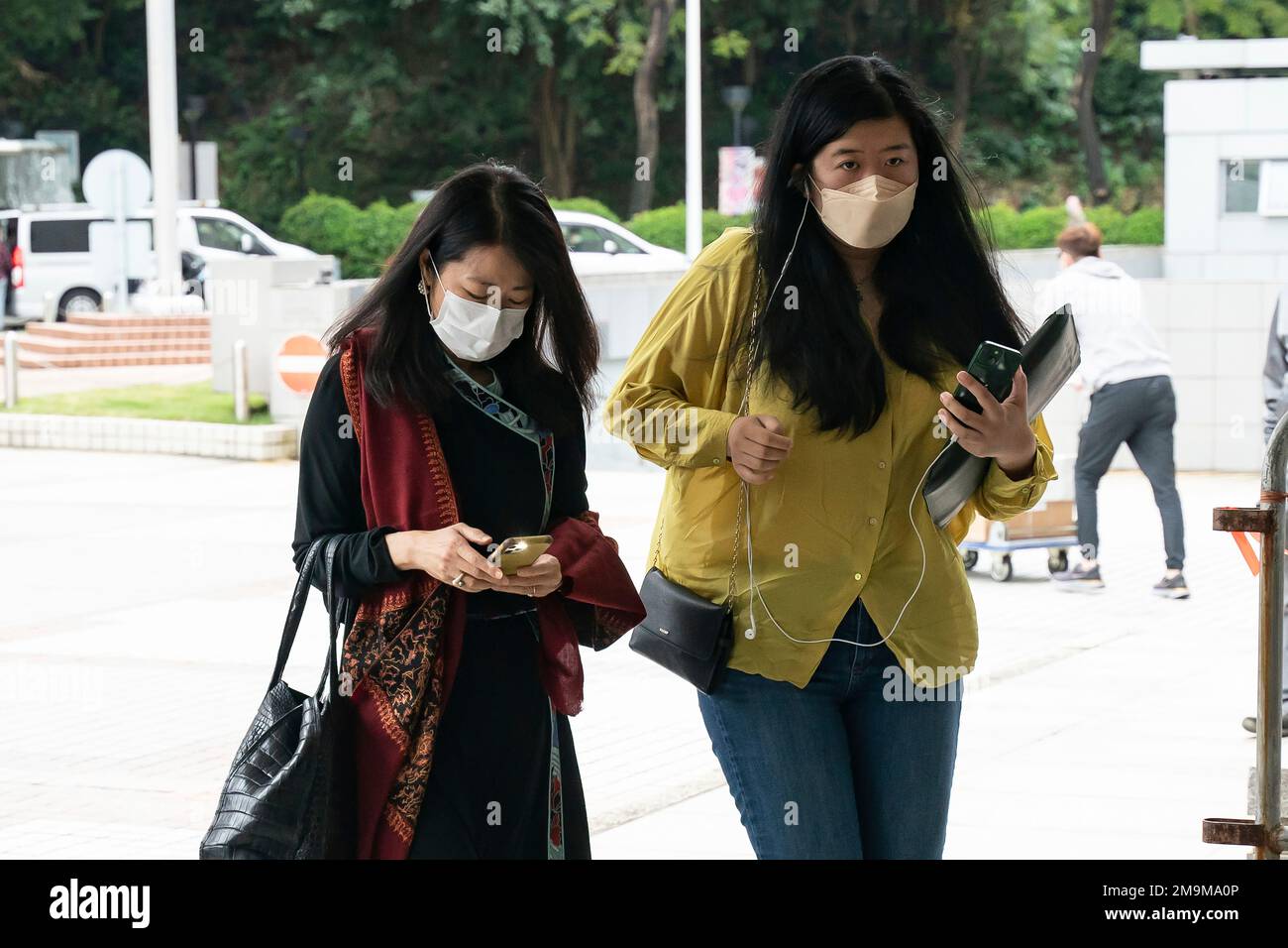 From left; wife of Hong Kong publisher Jimmy Lai, Teresa Lai and daughter Jade Lai arrive at the ...