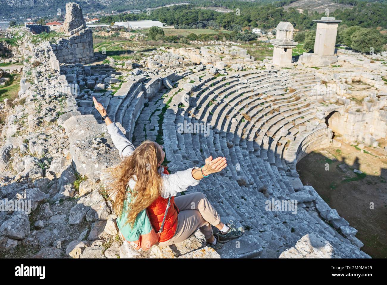 Woman looking at theater of Xanthos ancient city - part of Lycian way ...