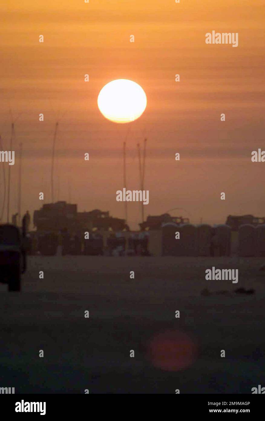 The Sun rises illuminating the dispersal area of the US Marine Corps ...