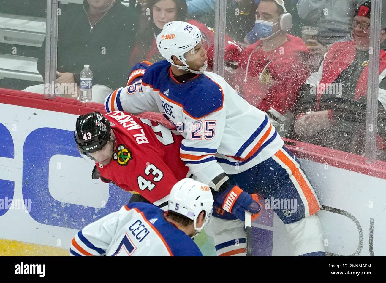 Chicago Blackhawks' Colin Blackwell (43) checks Edmonton Oilers ...
