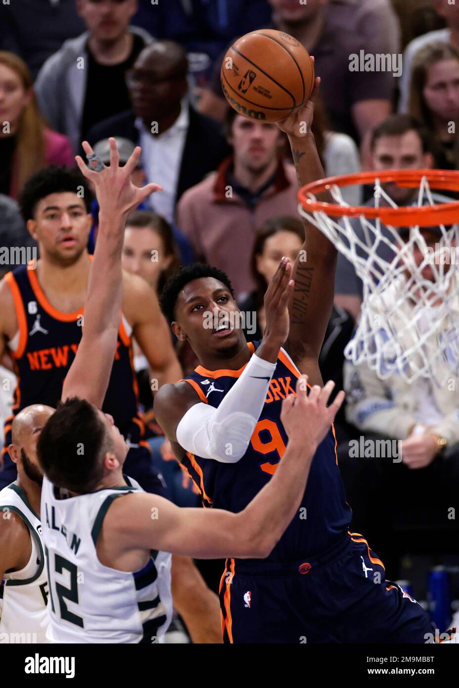 New York Knicks guard RJ Barrett (9) shoots over Milwaukee Bucks guard ...