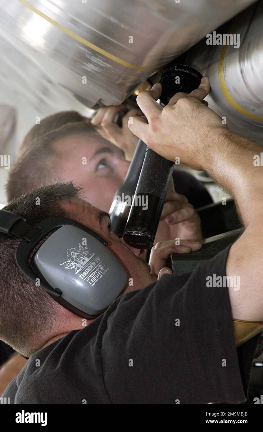 US Air Force (USAF) Weapons Loaders assigned to the 2nd Bomb Wing (BW ...