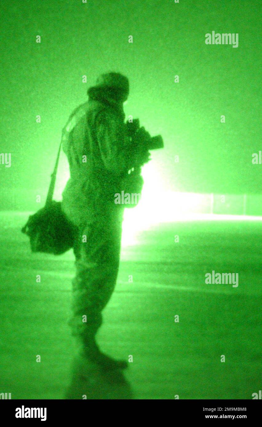 A nightscope view as US Air Force (USAF) AIRMAN (AMN) Bridget Rapp ...
