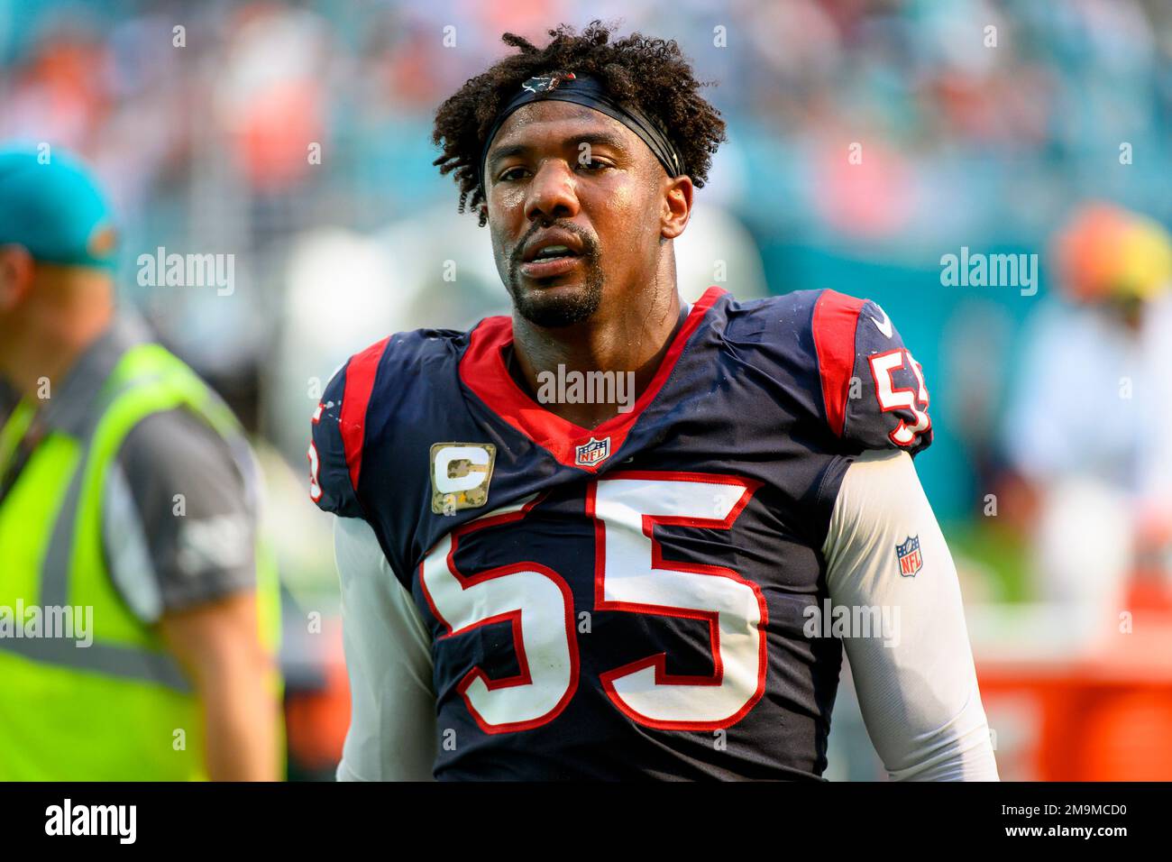 Houston Texans defensive lineman Jerry Hughes (55) walks off the field ...