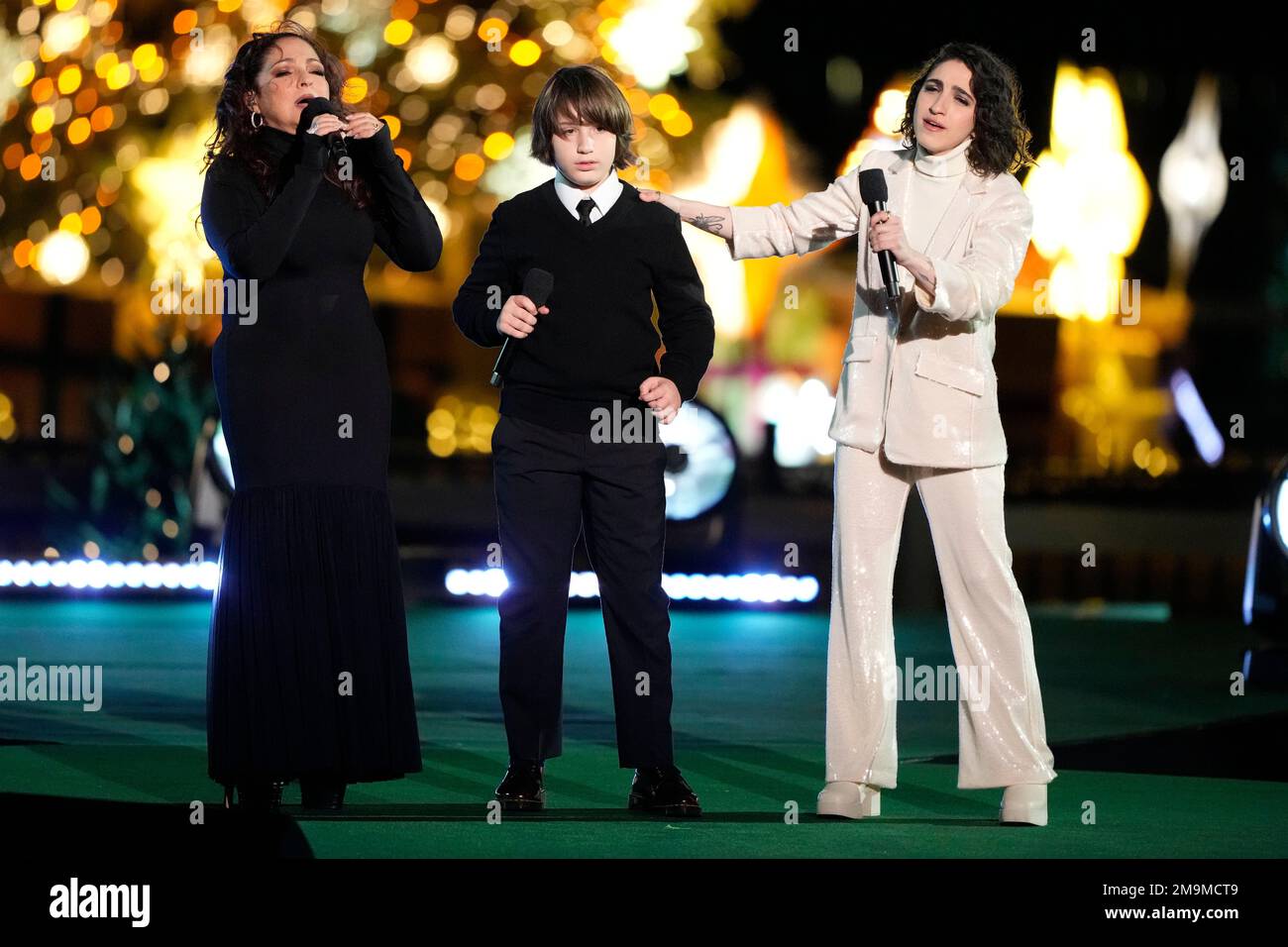 Gloria Estefan and her children Sasha and Emily, right, perform after ...