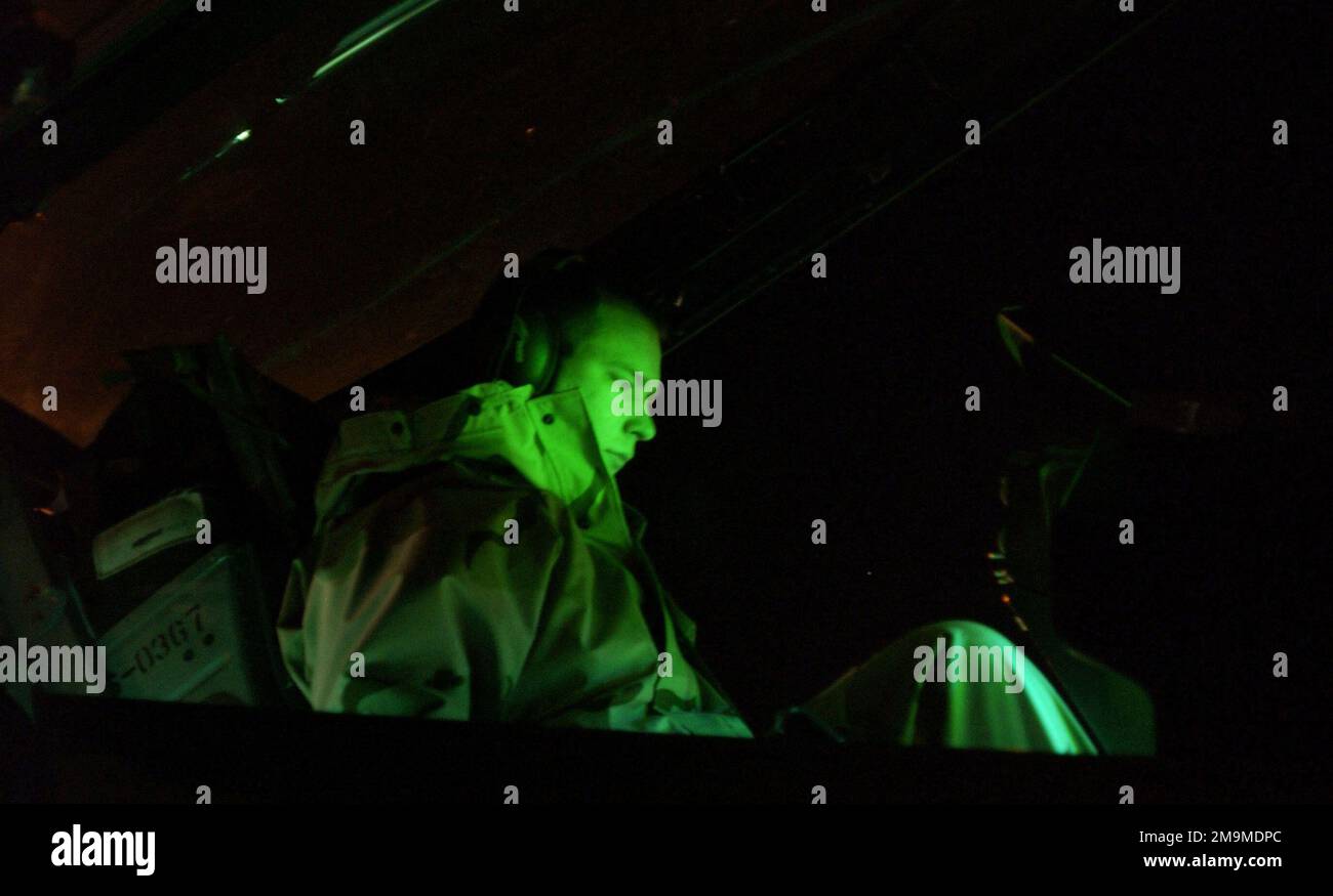 A US Air Force (USAF) crewchief assigned to the 410th Air Expeditionary ...