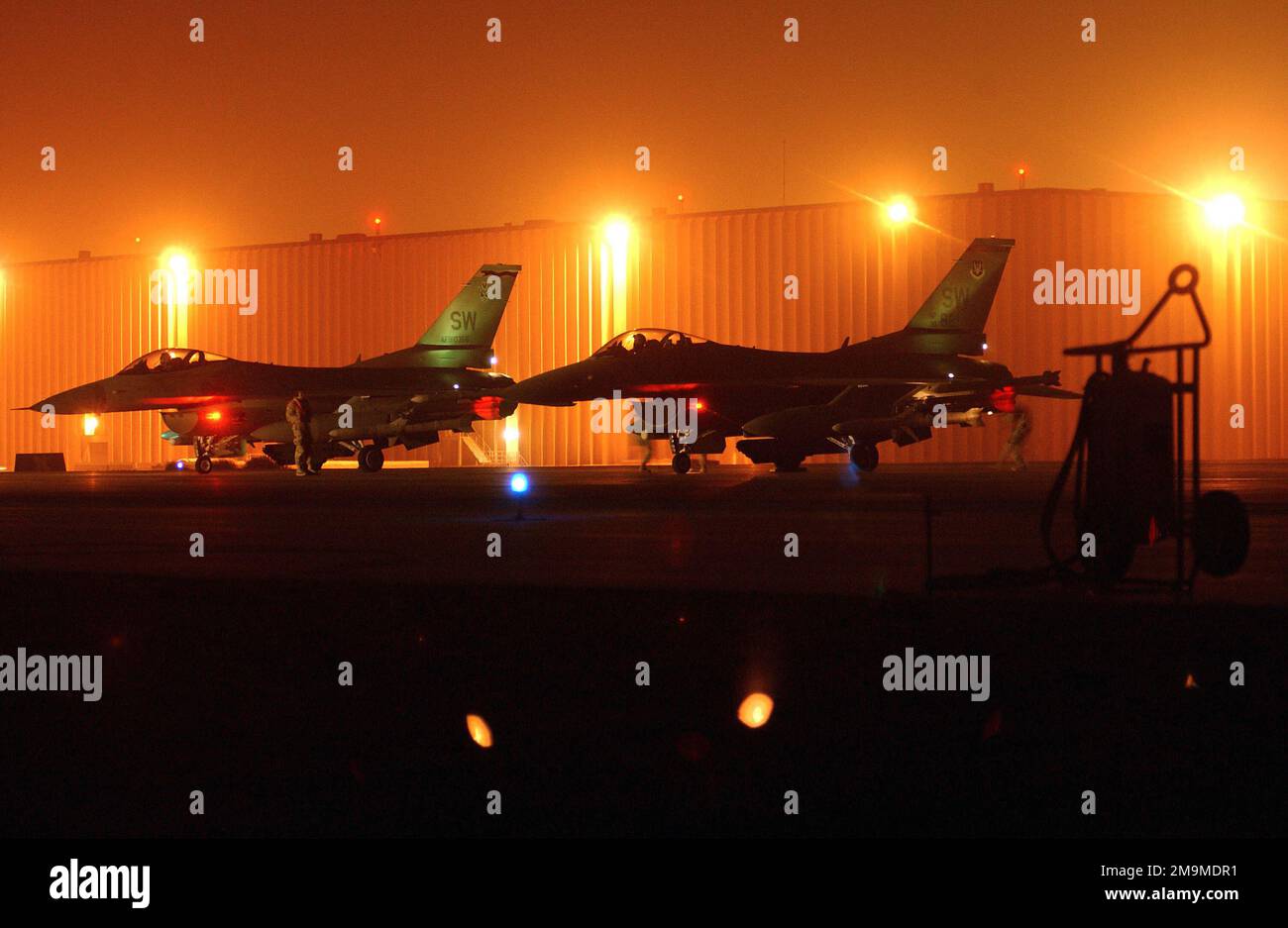 A pair of US Air Force (USAF) F-16CJ Fighting Falcons, 20th Fighter ...