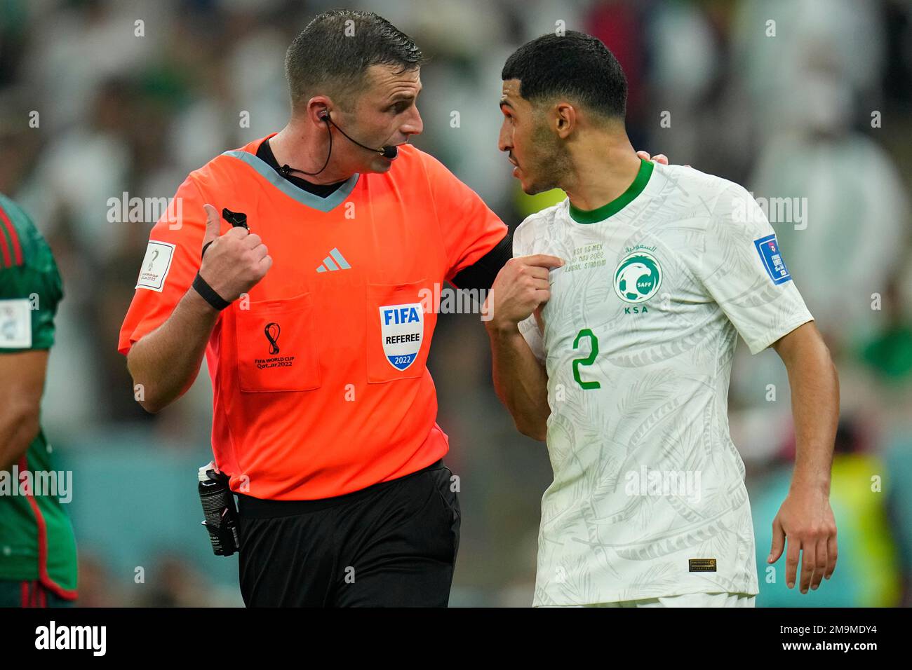 Saudi Arabia's Sultan Al-Ghanam talks with a referee during the World ...
