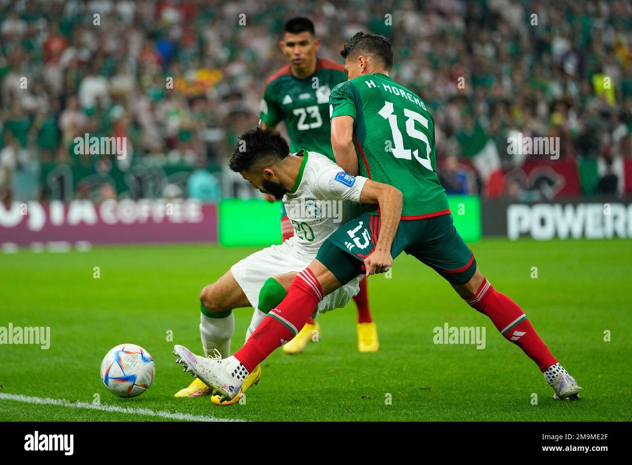 Saudi Arabia's Abdulrahman Al-Aboud grabs the shorts of Mexico's Hector ...