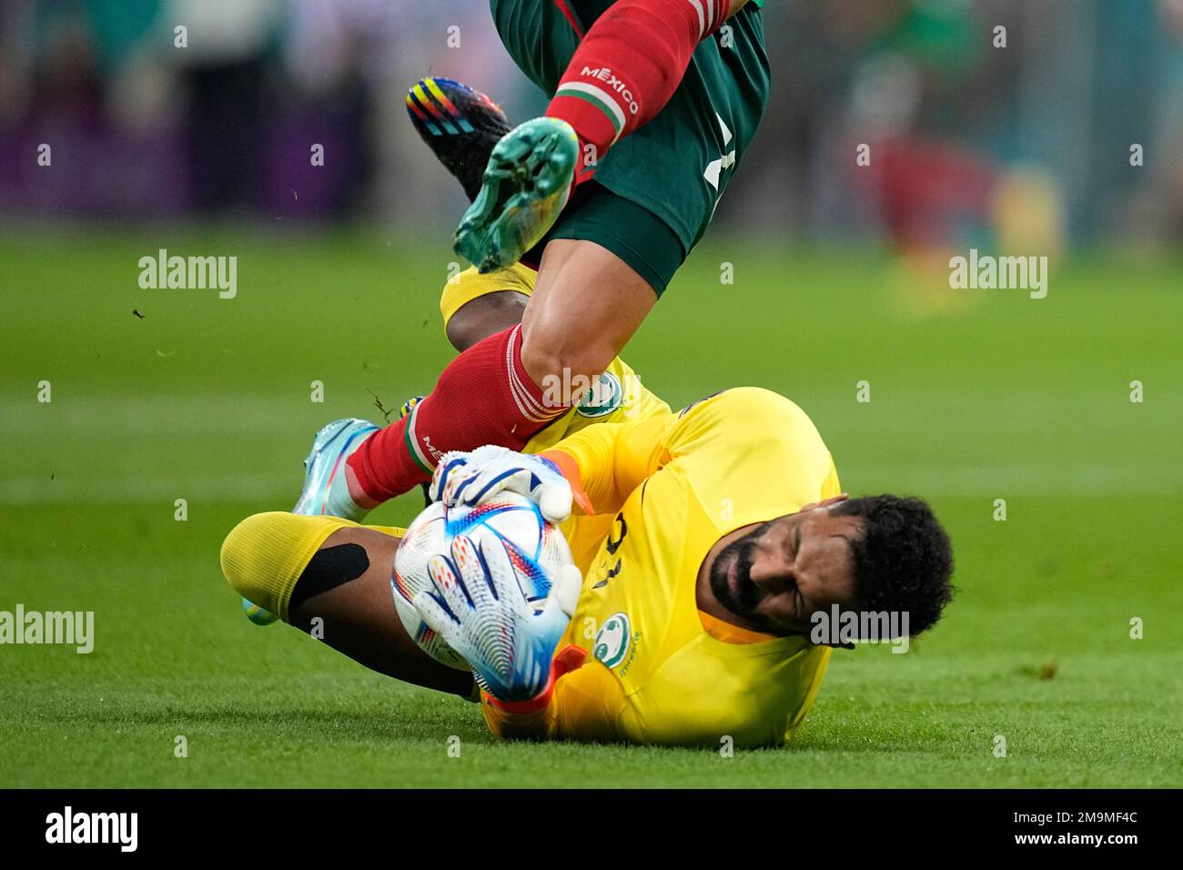 Saudi Arabia's goalkeeper Mohammed Al-Owais saves a ball during the ...