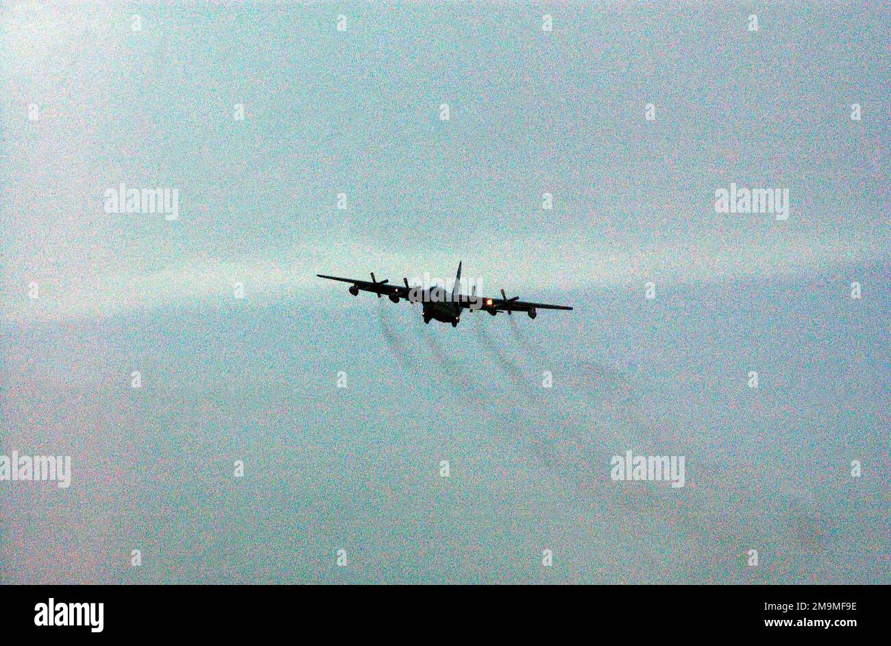 A US Marine Corps (USMC) KC-130 Hercules on approach to land after a ...