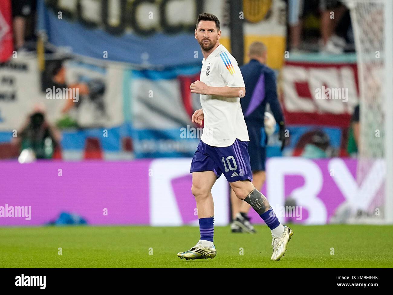 Argentina's Lionel Messi runs during warm up before the World Cup group ...