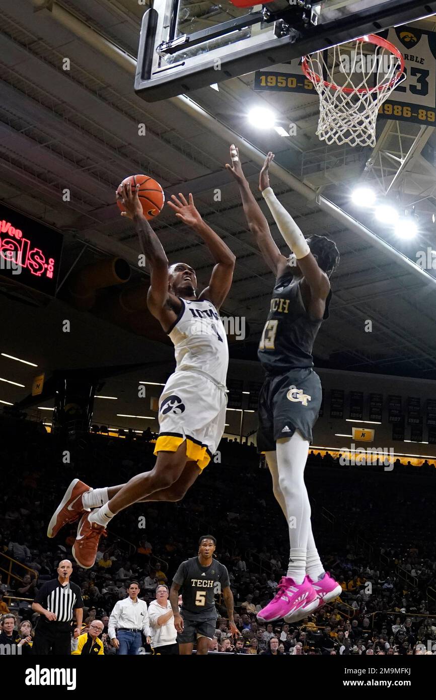 Iowa guard Ahron Ulis (1) shoots over Georgia Tech guard Miles Kelly ...