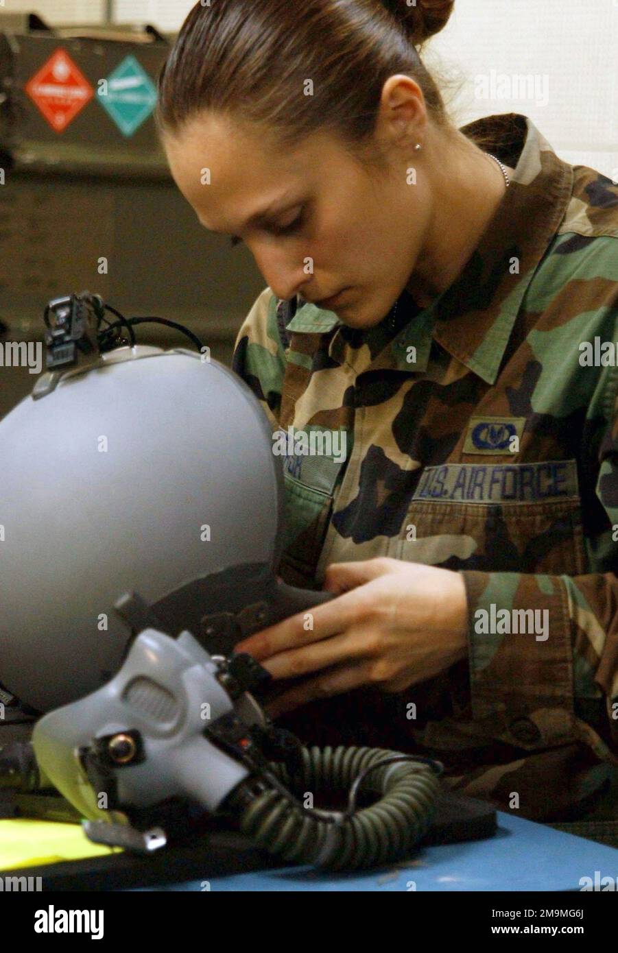 030322-F-9171L-001. [Complete] Scene Caption: STAFF Sergeant Suzanne ...