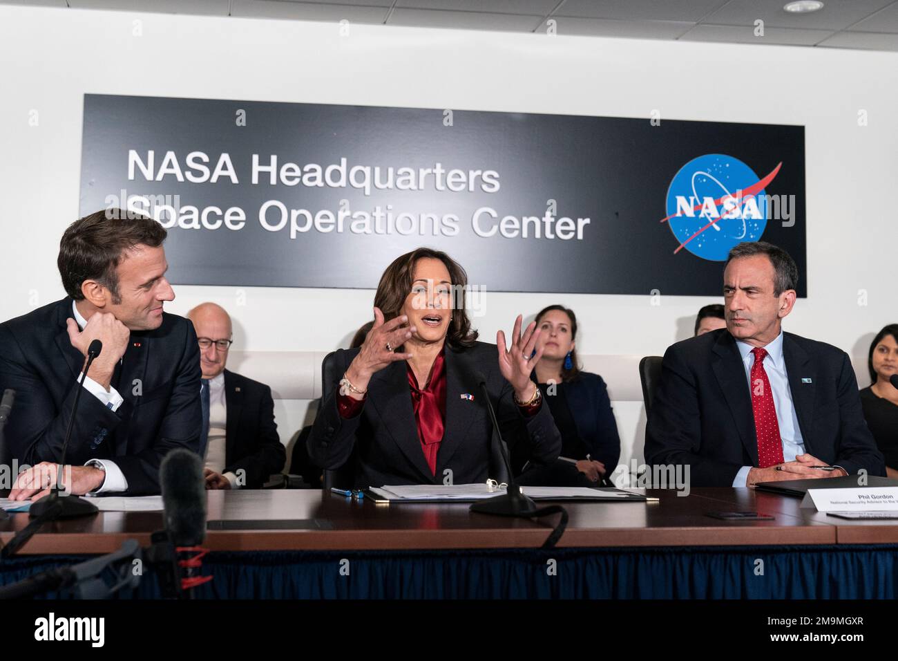 Vice President Kamala Harris and French President Emmanuel Macron speak ...